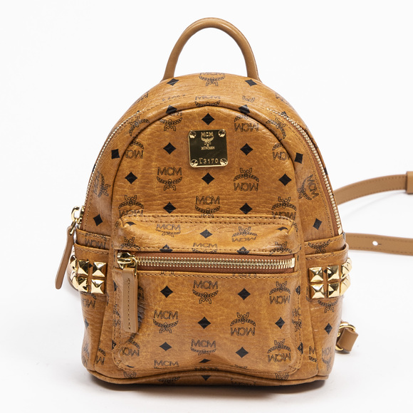 MCM | Bags | Mcm Mini Stark Side Studded Backpack In Cognac Visetos ...